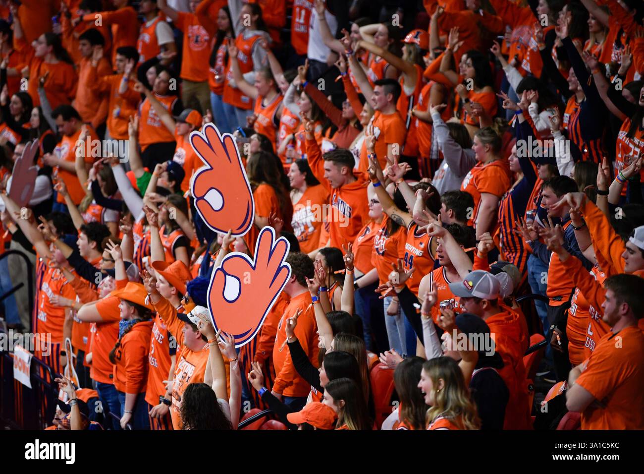 CHAMPAIGN, IL - MARCH 07: The Orange Krush Student Section cheers after ...