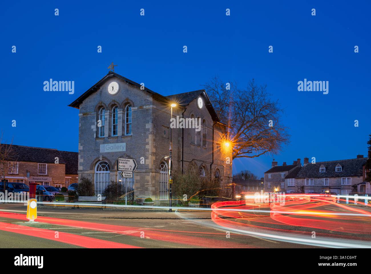 The Town hall at dusk with light trails. Bampton, Oxfordshire, England ...