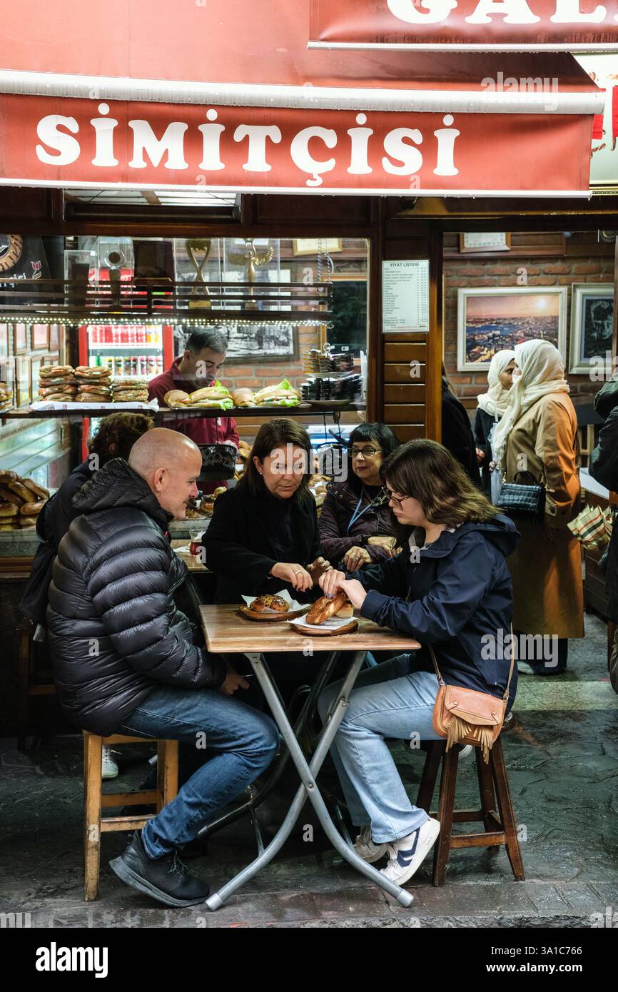Istanbul, Turkey, Turkiye. Patrons at Sidewalk Tables of a Cafe ...