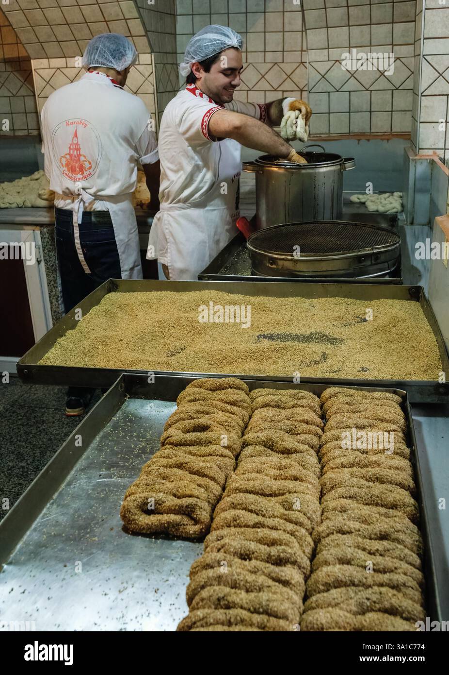 Istanbul, Turkey, Turkiye. Baker Placing Simit, Traditional Turkish ...