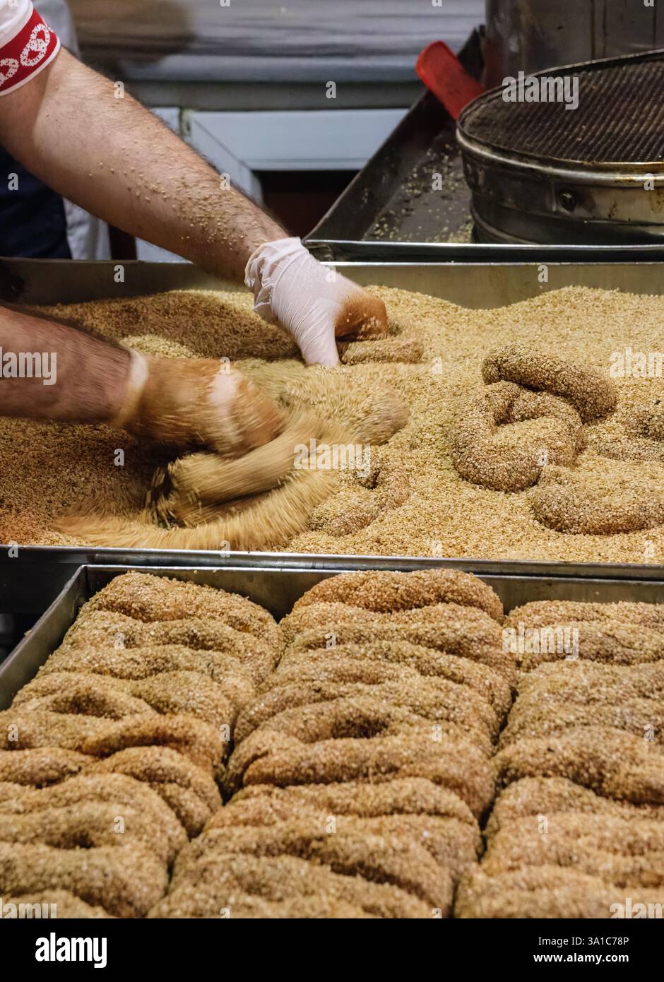 Istanbul, Turkey, Turkiye. Baker Covering Simit, Traditional Turkish ...