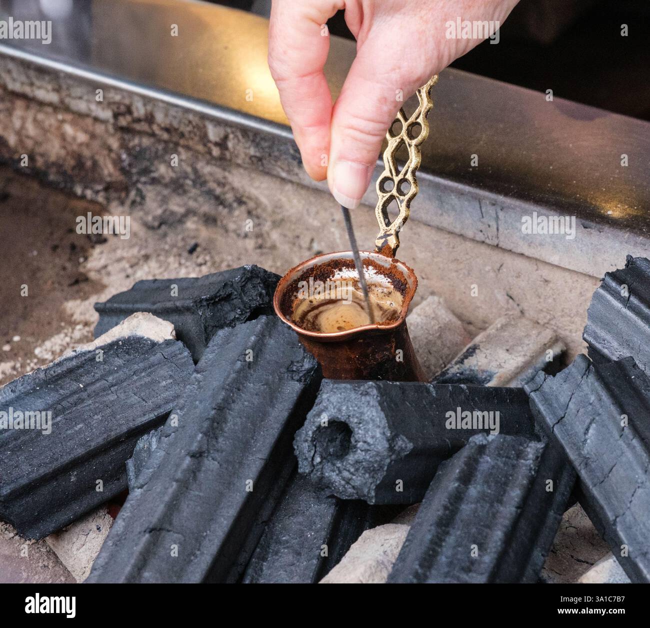 Istanbul, Turkey, Turkiye. Stirring Turkish Coffee at a Sidewalk Cafe ...