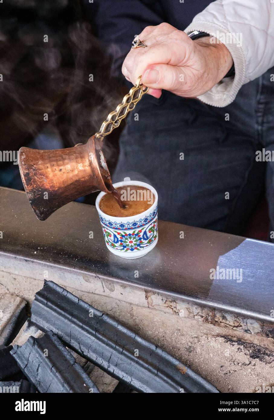 Istanbul, Turkey, Turkiye. Pouring Turkish Coffee into a Cup Stock ...