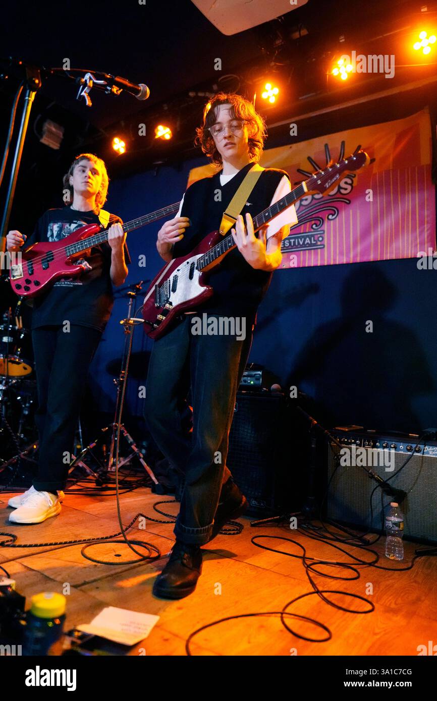 Mischa Dempsey from the band knitting performs during The New Colossus ...