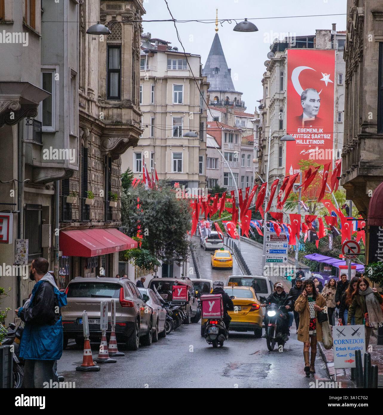 Istanbul, Turkey, Turkiye. Karakoy Street Scene. Ataturk Banner ...