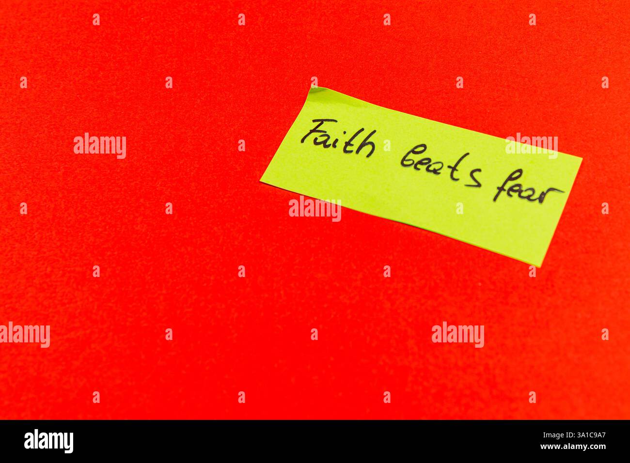 Bright red background features a sticky note with the encouraging ...