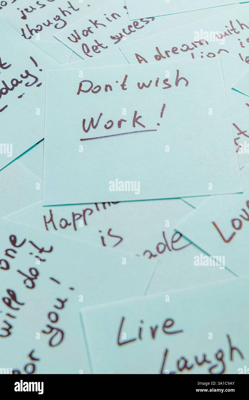 Brightly colored notes filled with motivational messages are spread ...