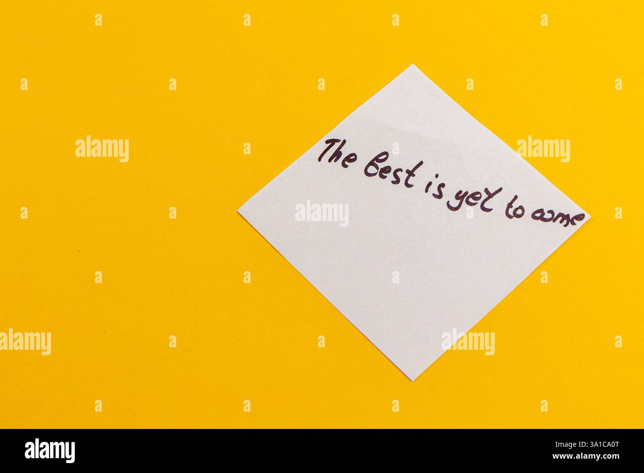 A handwritten note displays the motivational phrase The best is yet to ...