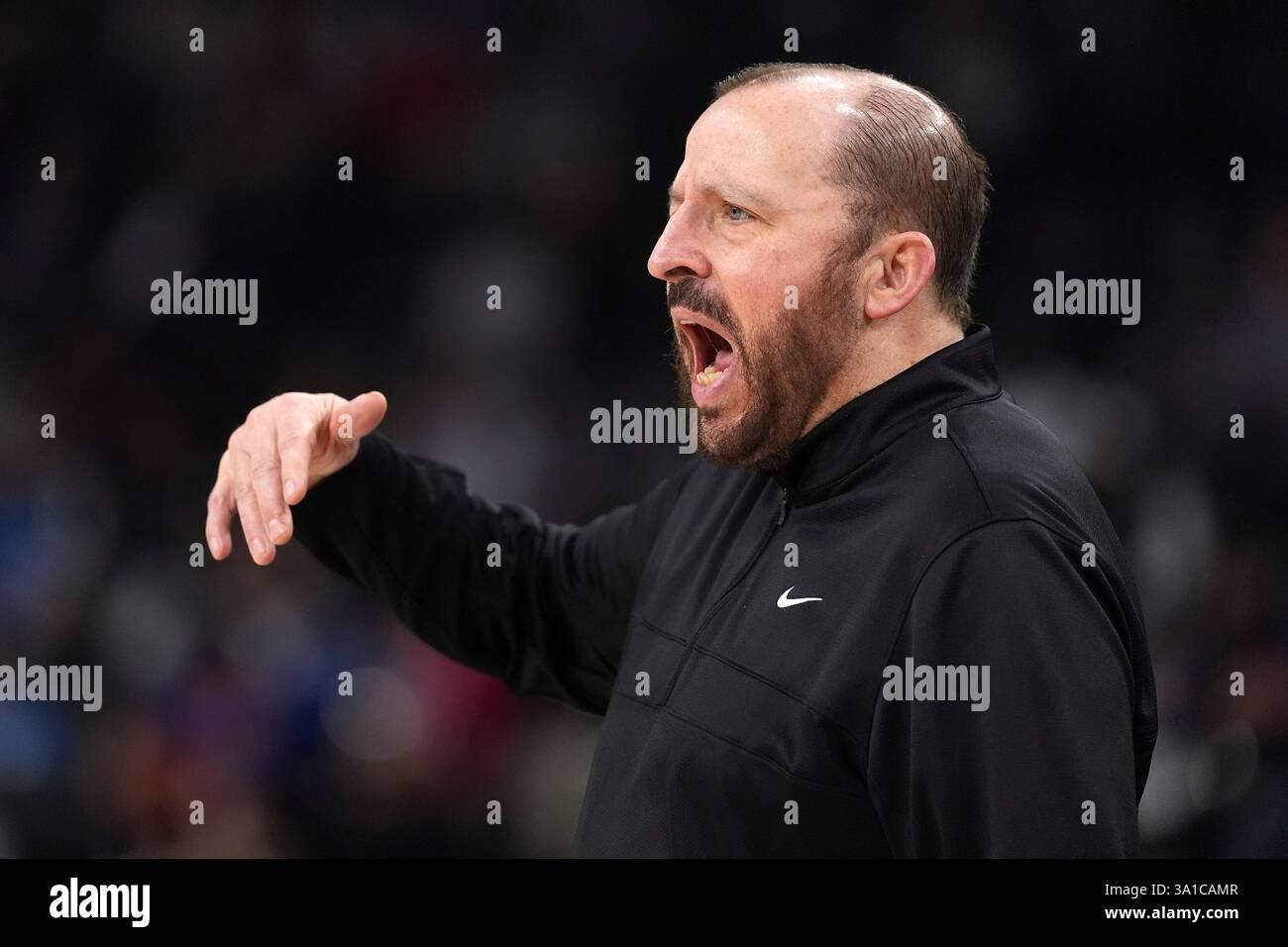 New York Knicks head coach Tom Thibodeau gestures during the second ...