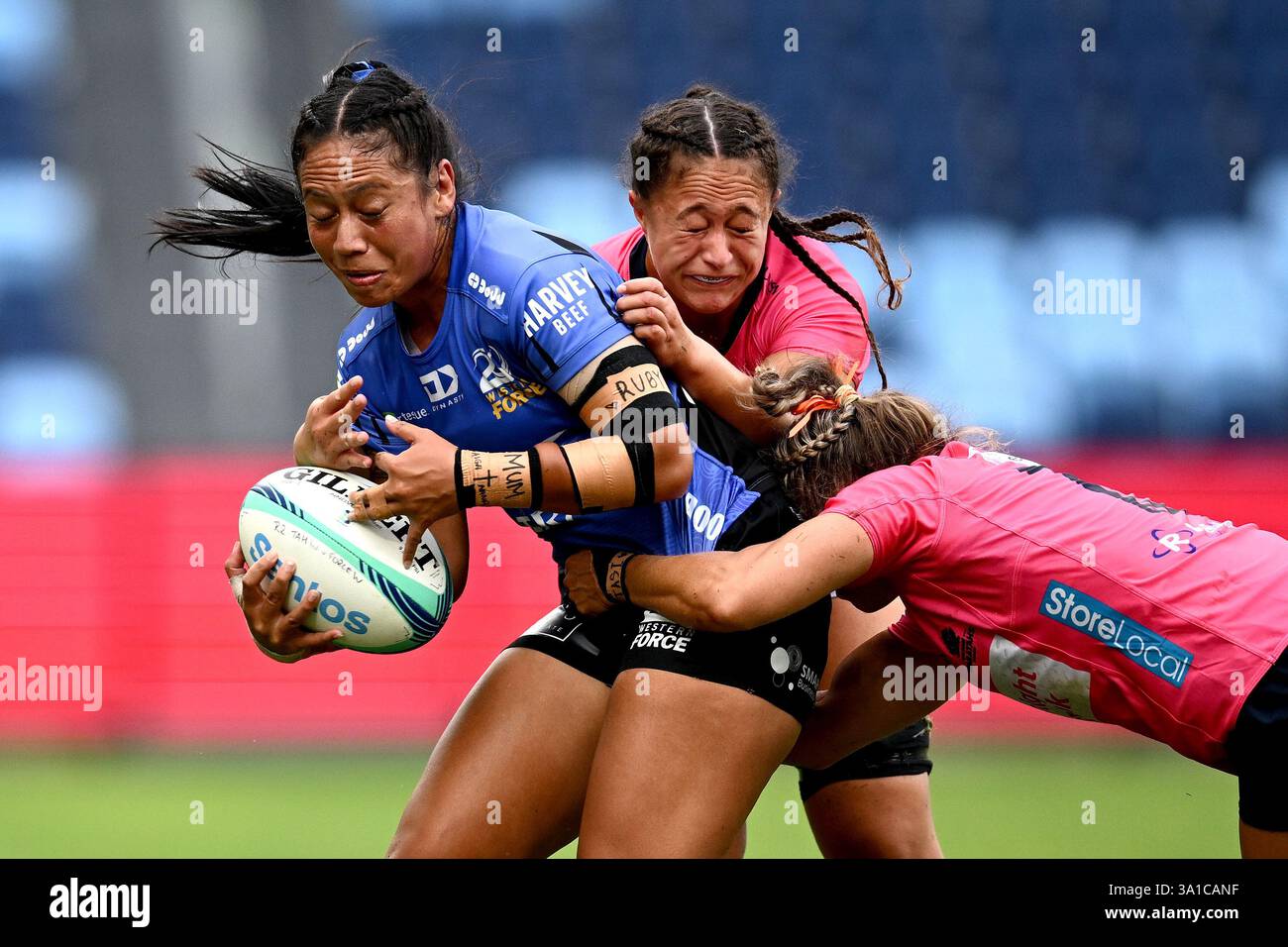 Cecilia Smith of the Force is tackled by Leilani Nathan and Georgina ...