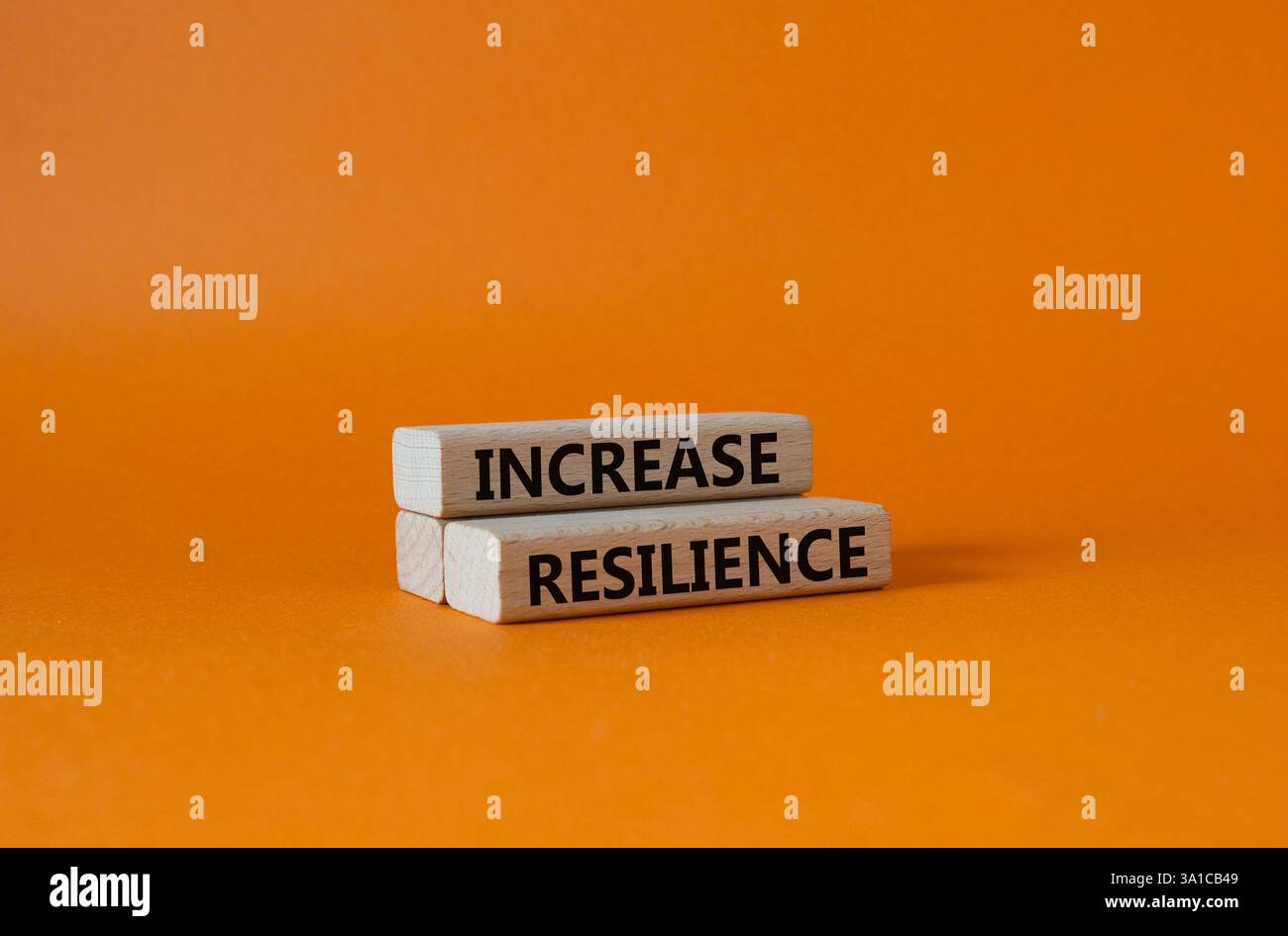 Increase resilience symbol. Wooden blocks with words Increase ...
