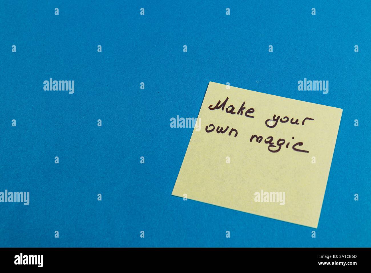 A simple sticky note featuring the handwritten phrase Make your own ...