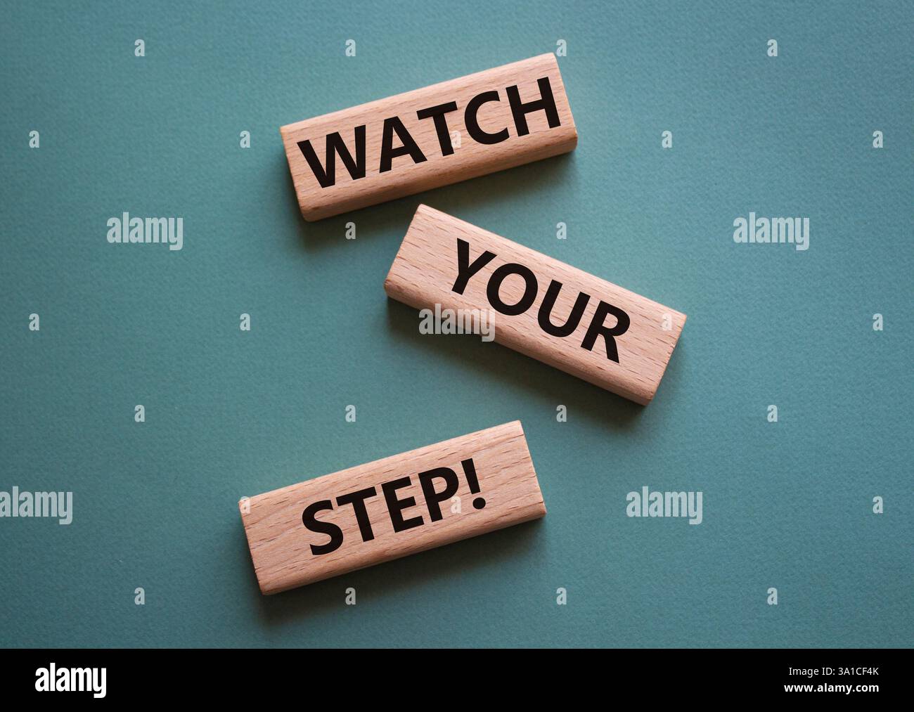 Watch your Step symbol. Concept words Watch your Step on wooden blocks ...
