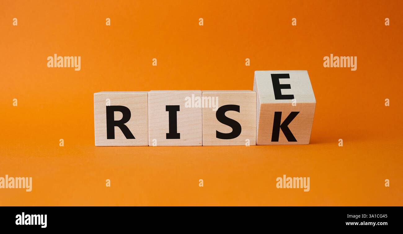 Rise vs Risk symbol. Turned wooden cubes with words Risk vs Rise ...