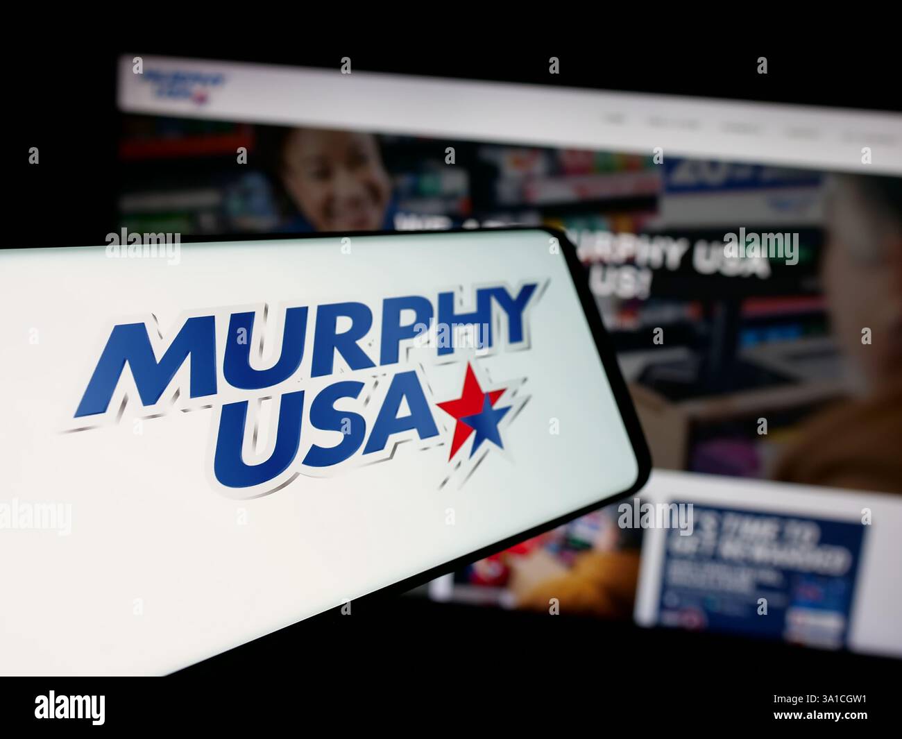 In this photo illustration, a mobile phone with the logo of American ...