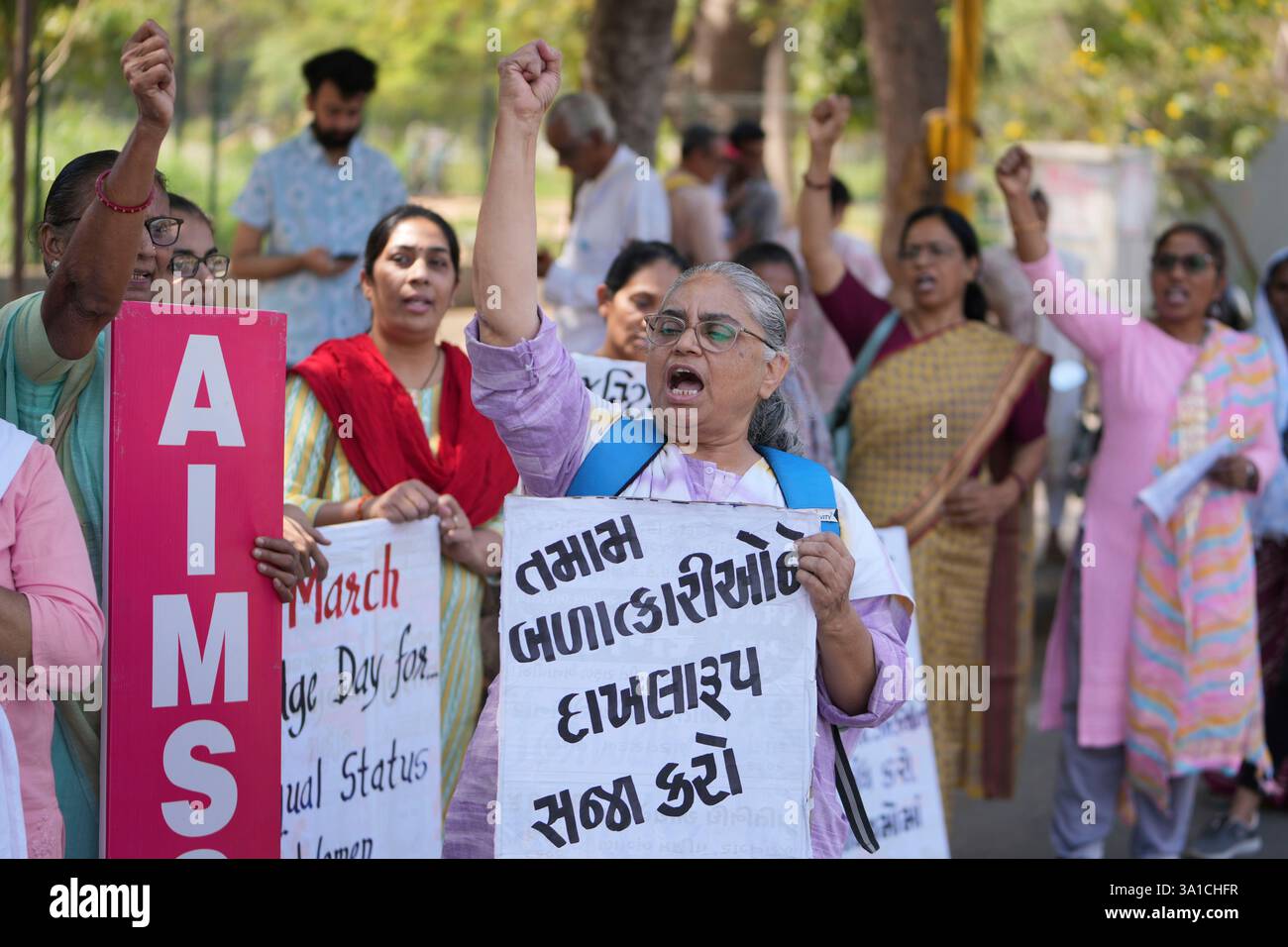Women shout slogans during a demonstration to mark International Women ...