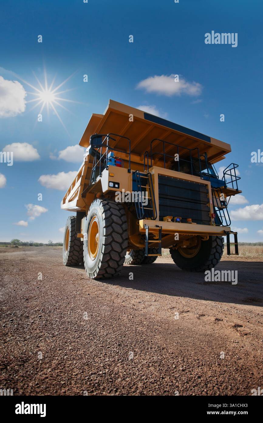 mining truck in a diamond mine, driving on dirt road gravel, brand new ...