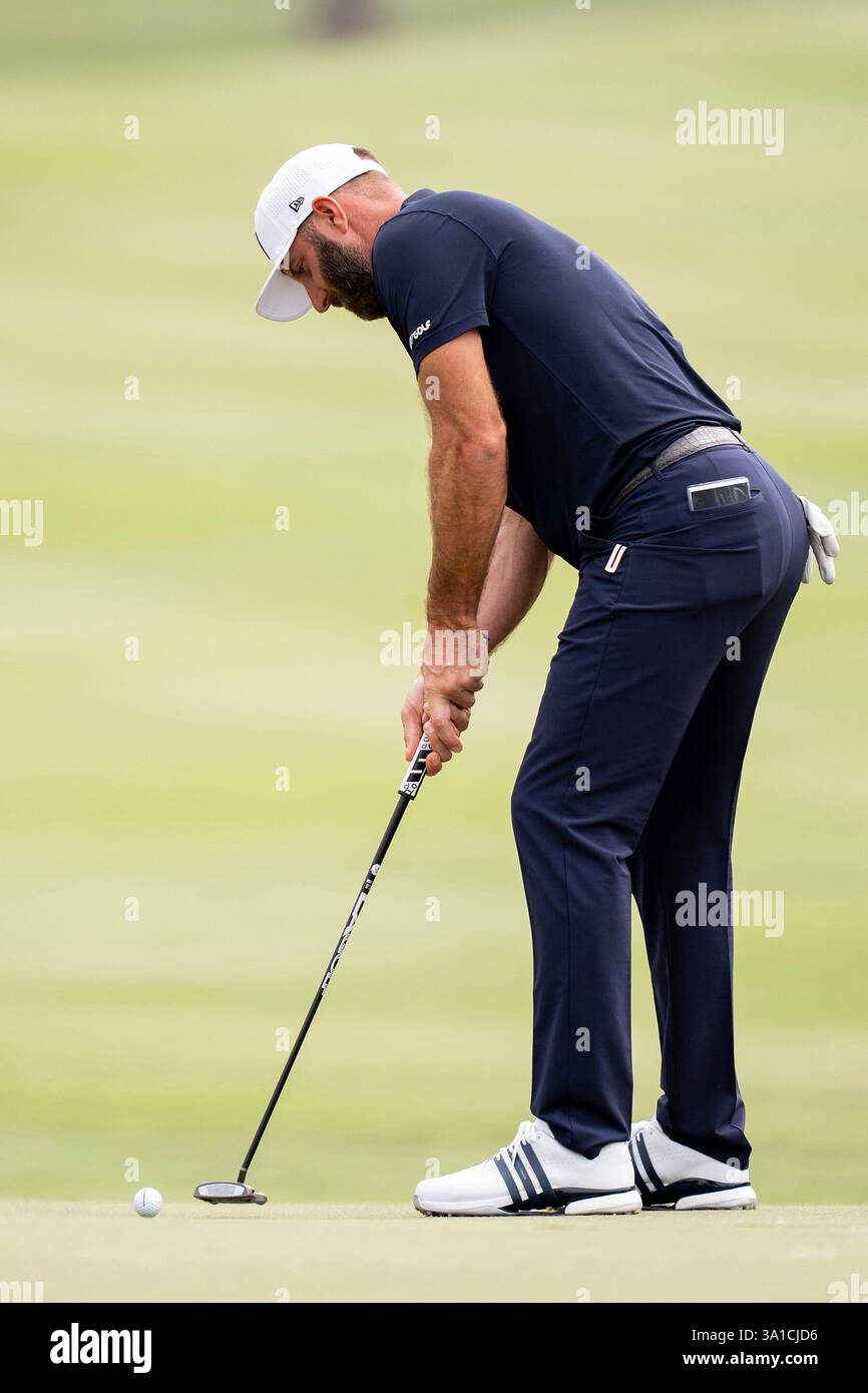 Captain Dustin Johnson of 4Aces GC putts on the sixth green during the ...