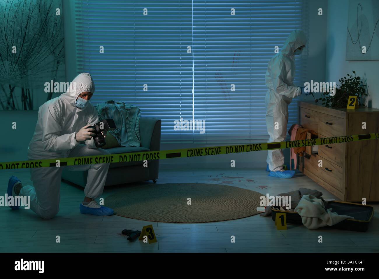 Forensic experts working at crime scene indoors Stock Photo - Alamy