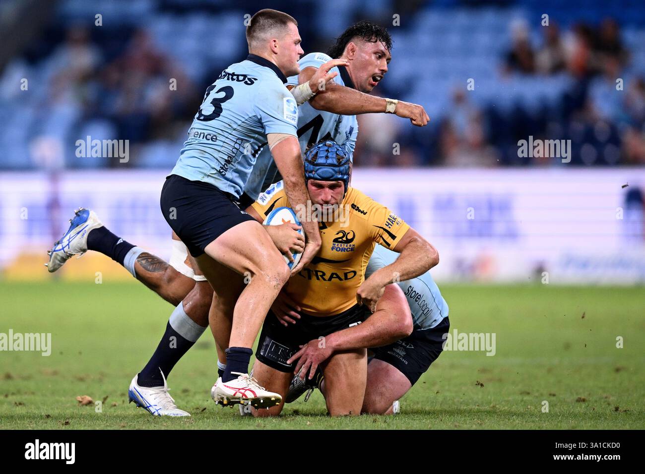 Hamish Stewart of the Force is tackled by Henry O'Donnell (left) Rob ...