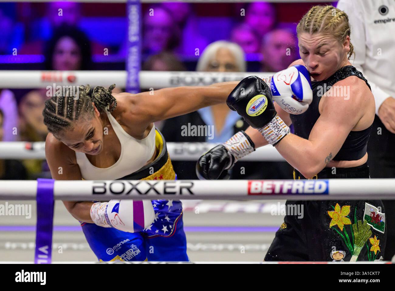 Royal Albert Hall, London March 07 2025 Natasha Jonas landing a punch during the WBC, IBF and ...