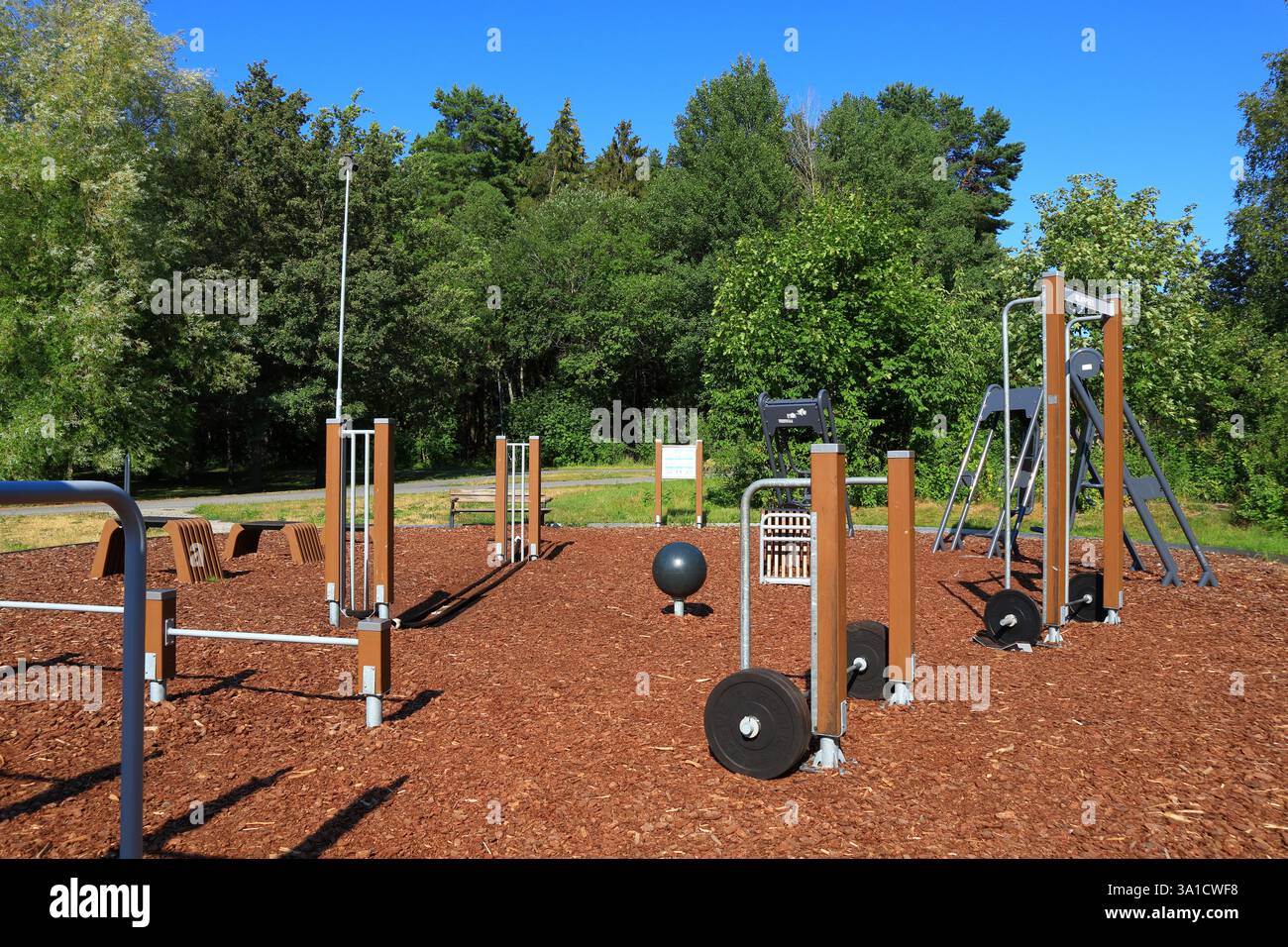 One Swedish outdoor gym. Summer time with nice sunny weather. Public ...