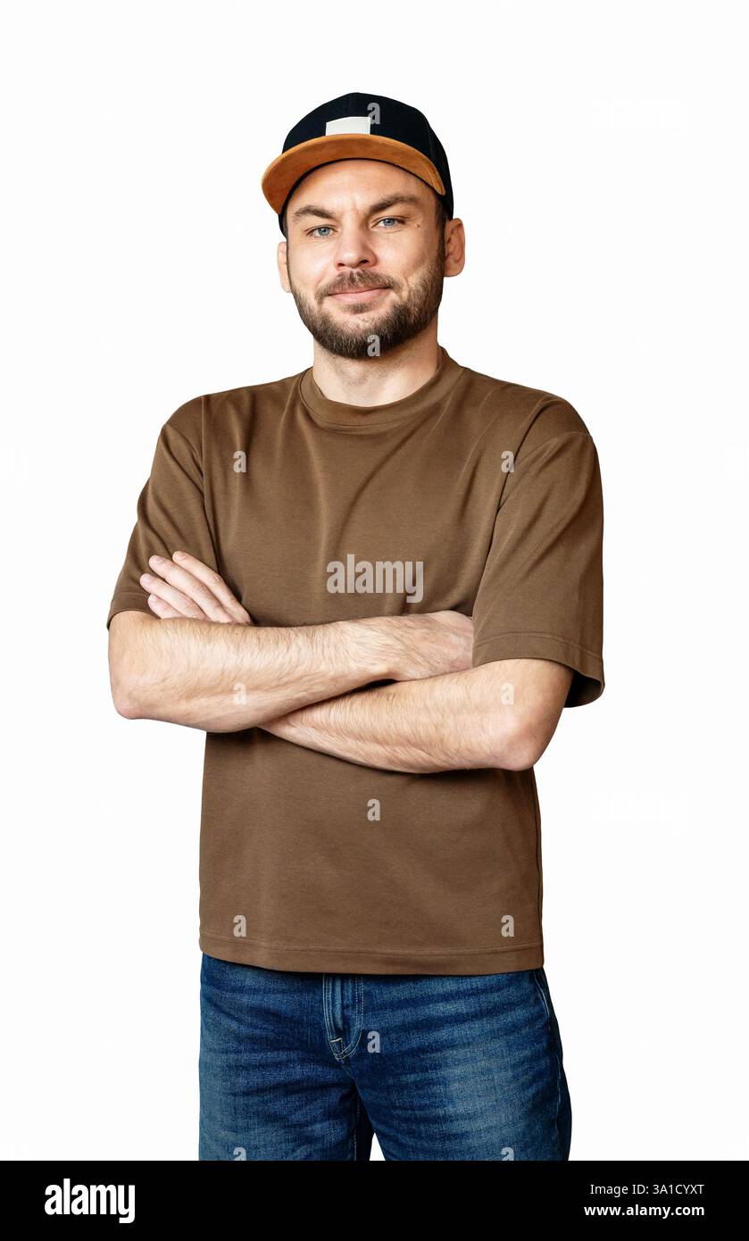 Isolated man with short beard in brown t-shirt and snapback standing ...