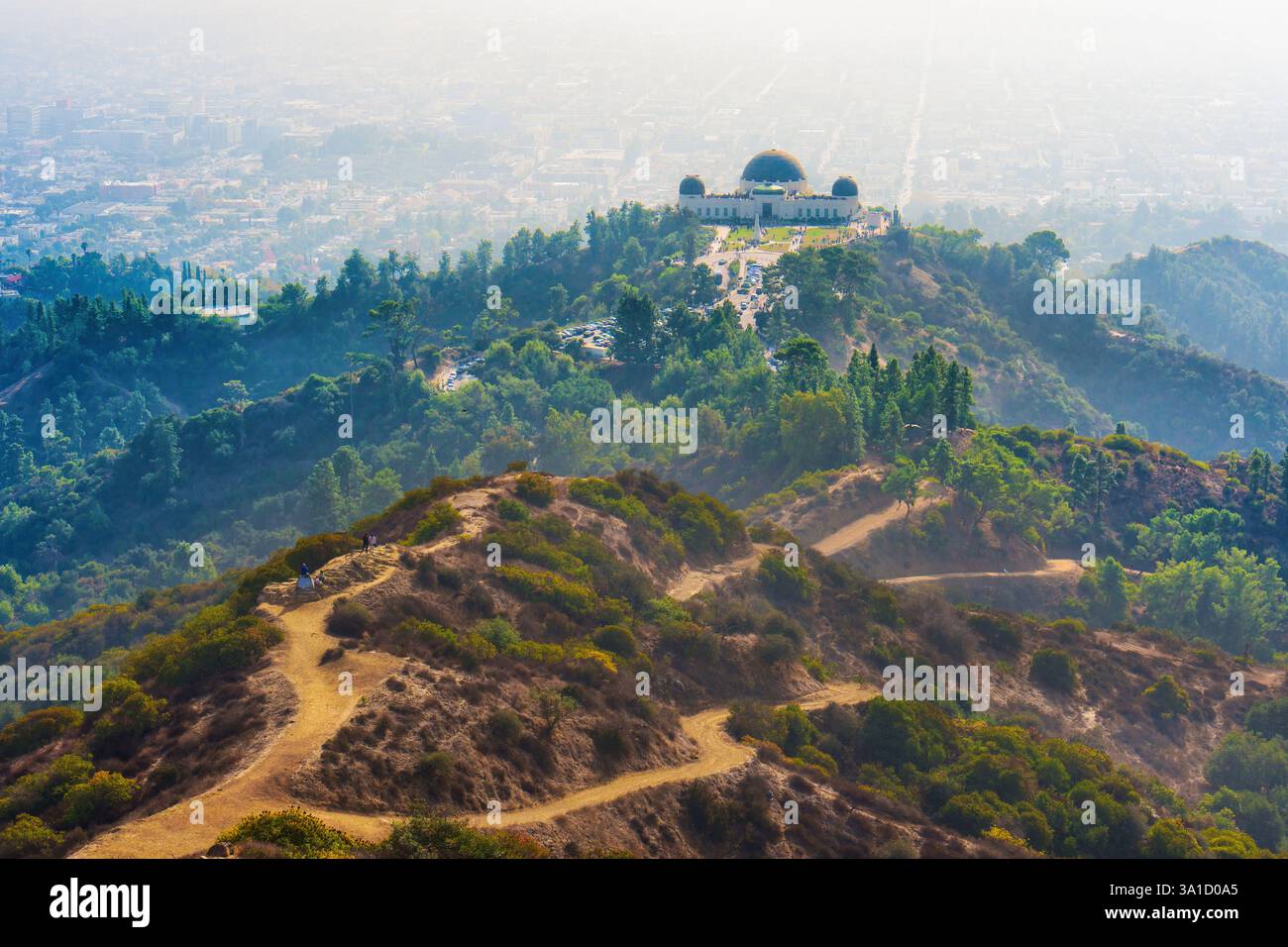Aerial view of Griffith Observatory on a hillside with many visitors ...