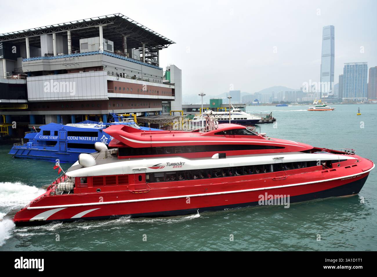 Turbojet catamaran departs from Hong Kong Sheung Wan pier to Macau ...