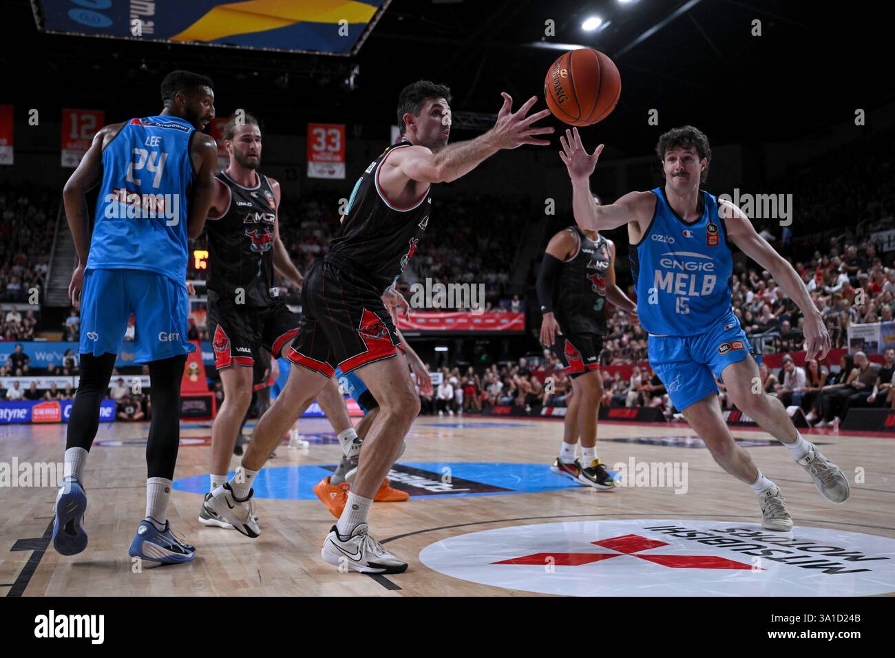 Todd Blanchfield of the Hawks and Kyle Brown of United during the NBL ...