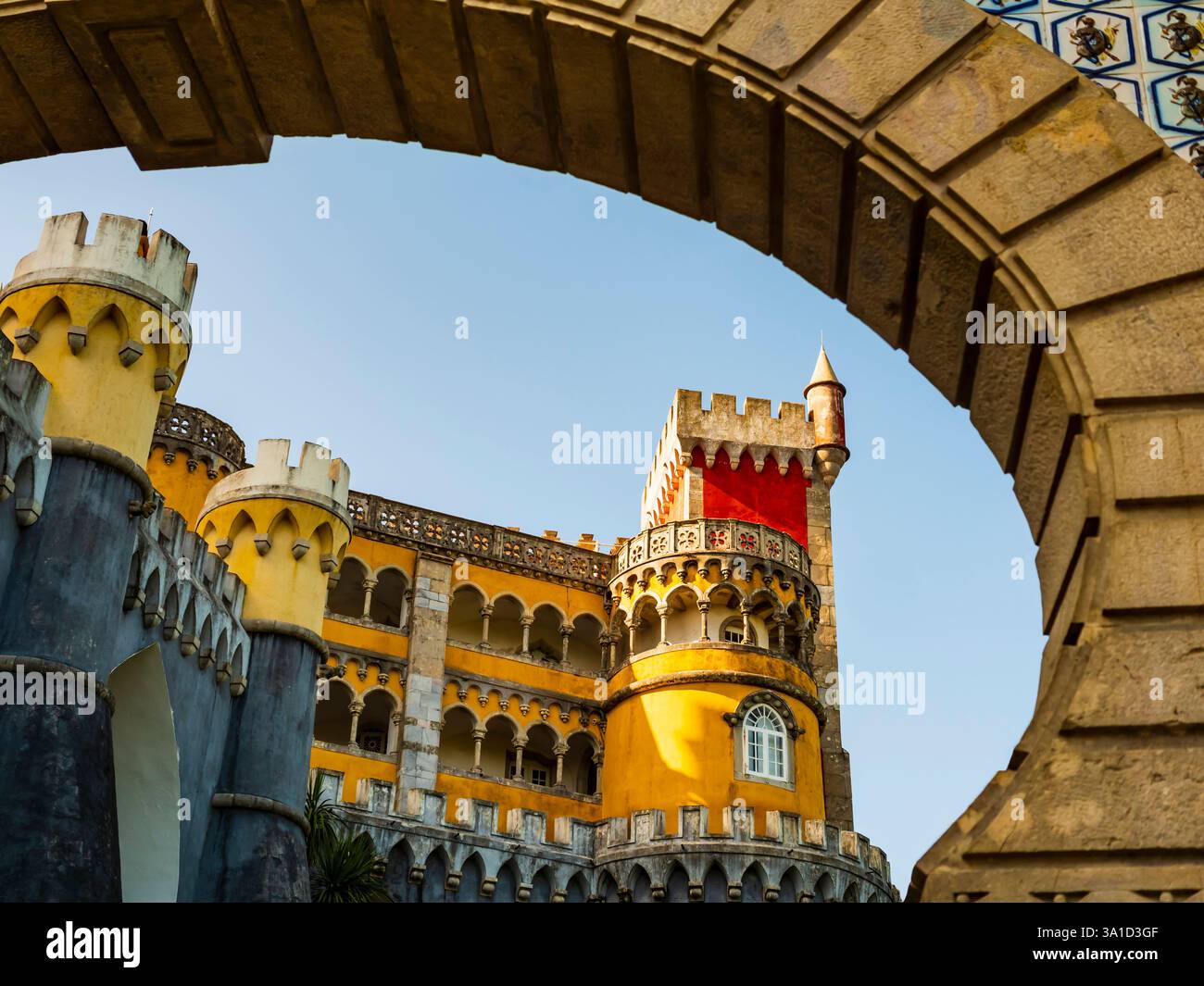 Amazing view of famous Pena Palace with the yellow arches yard and the ...
