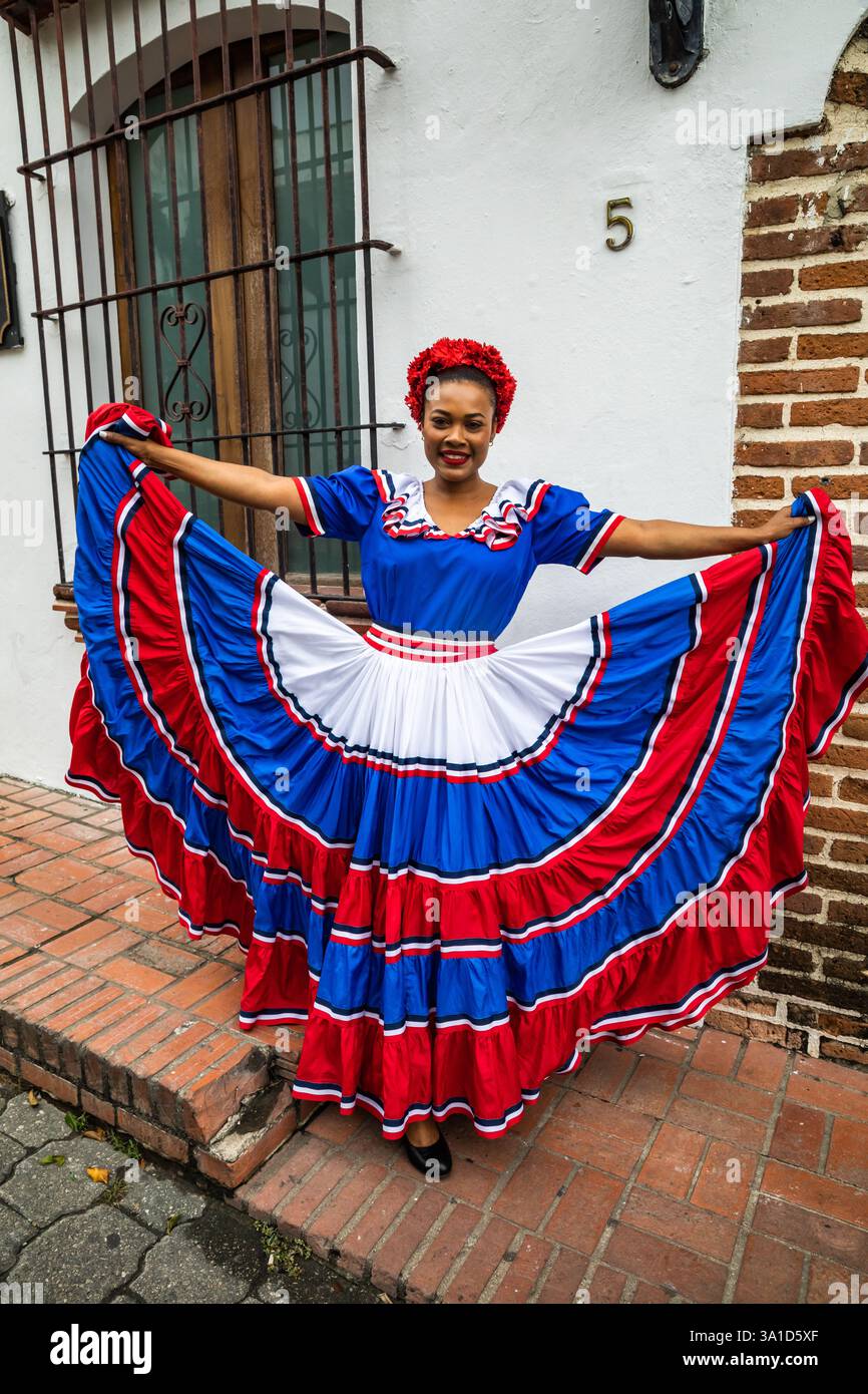 People dressed in Traditional Costumes outside a restaurant in Santo ...