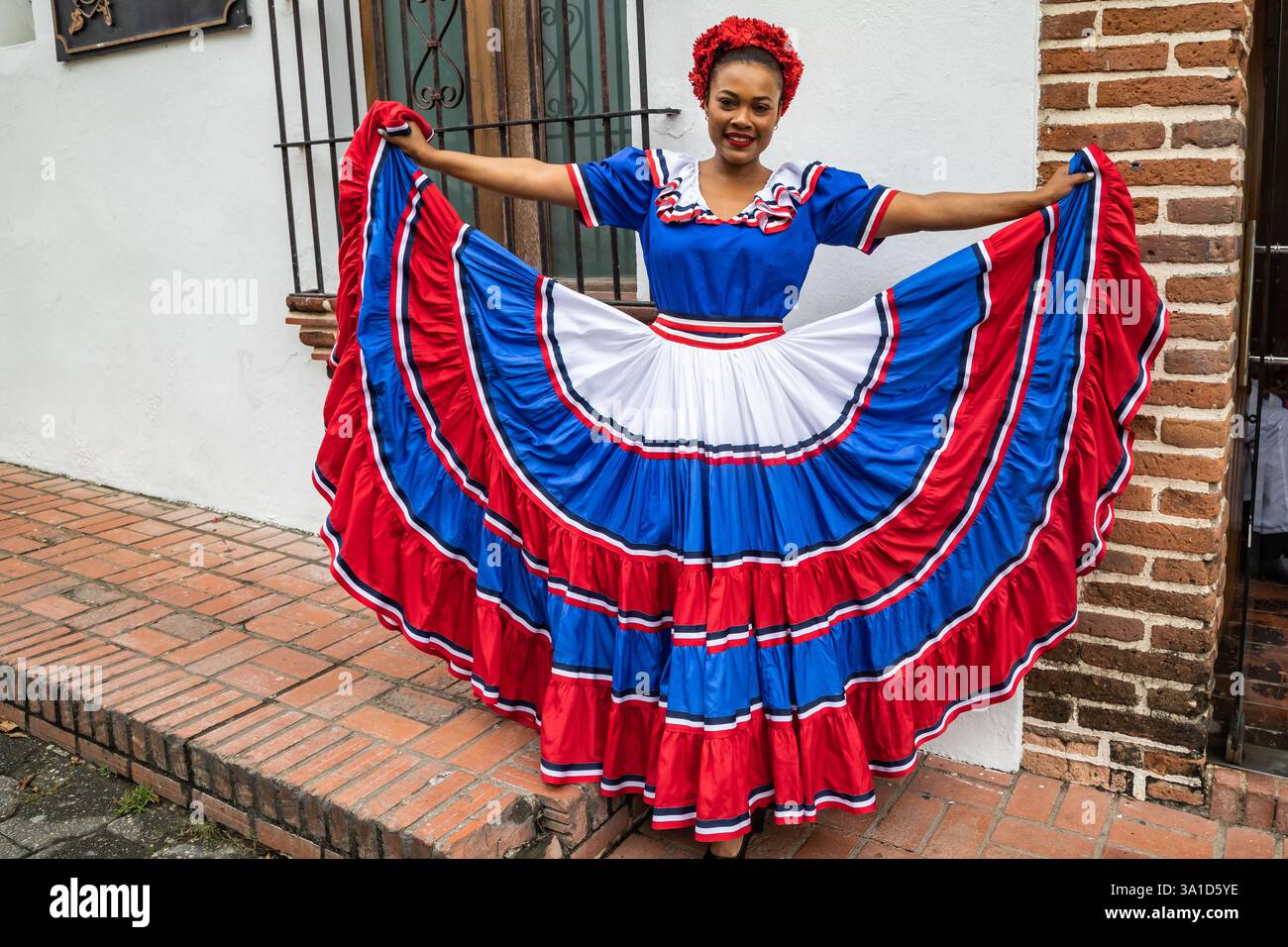 People dressed in Traditional Costumes outside a restaurant in Santo ...