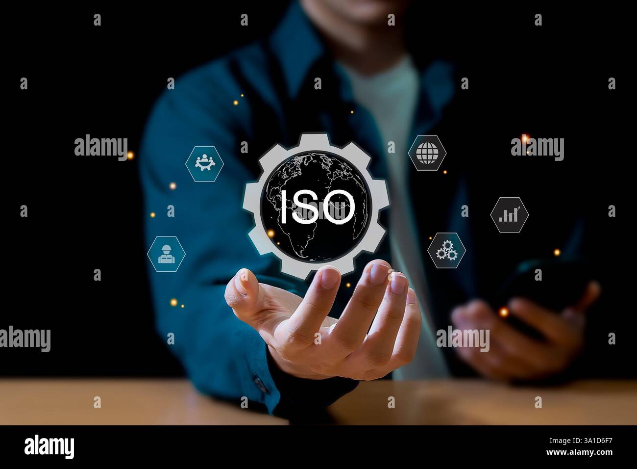 Businessman ISO symbol showing quality assurance on virtual screen ...