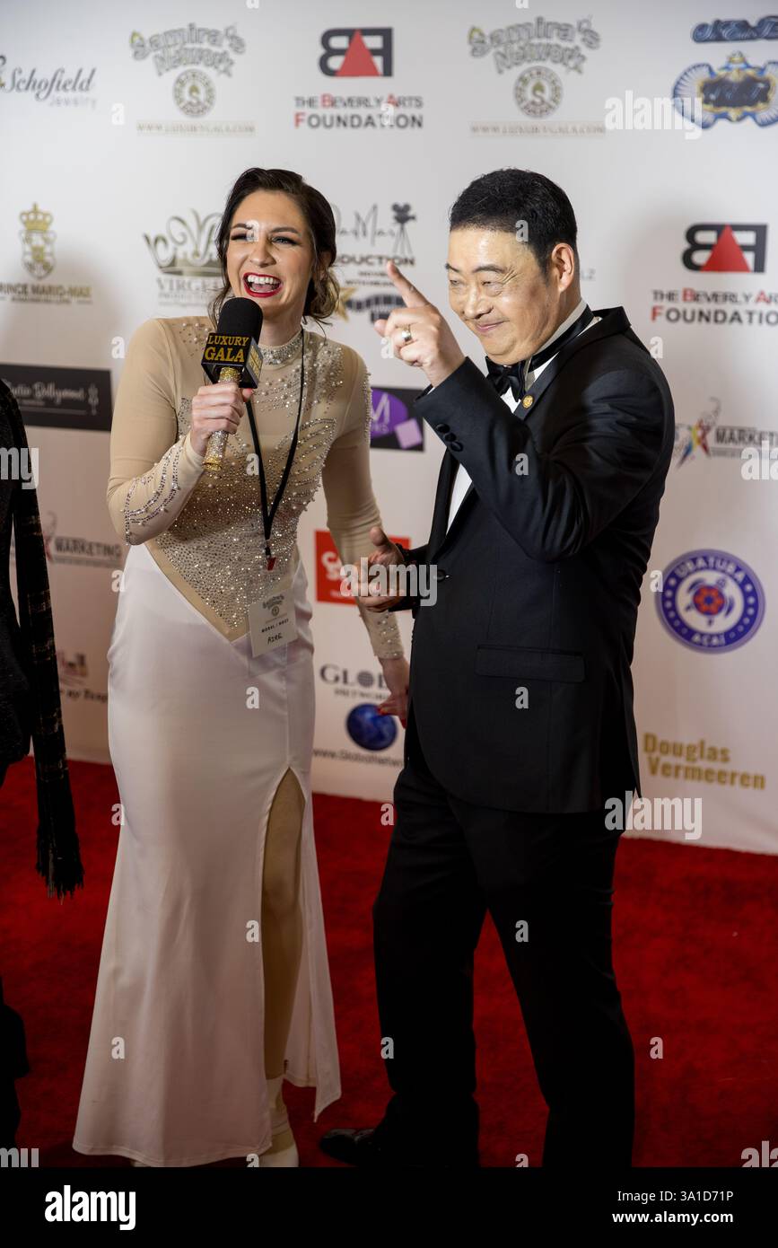 Joey Zhou, TV Host/ LABA founder is being interviewed on the red carpet ...