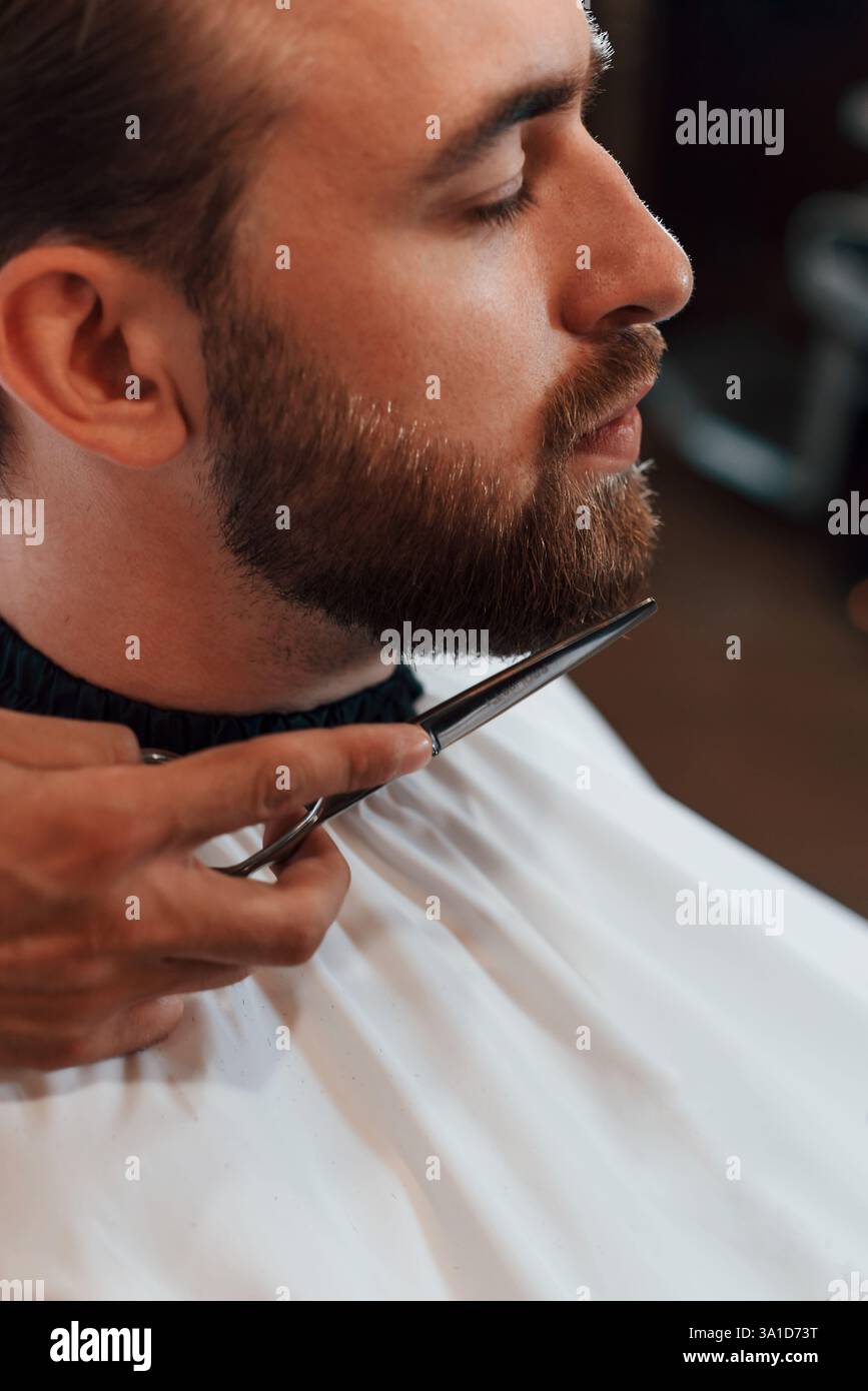 Man is visiting modern barber shop. Modern style Stock Photo - Alamy