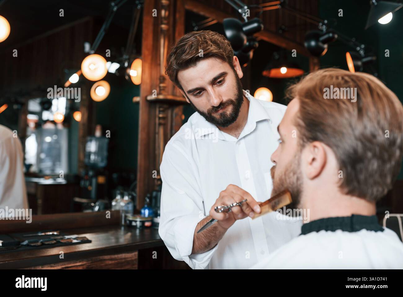 Man is visiting modern barber shop. Modern style Stock Photo - Alamy