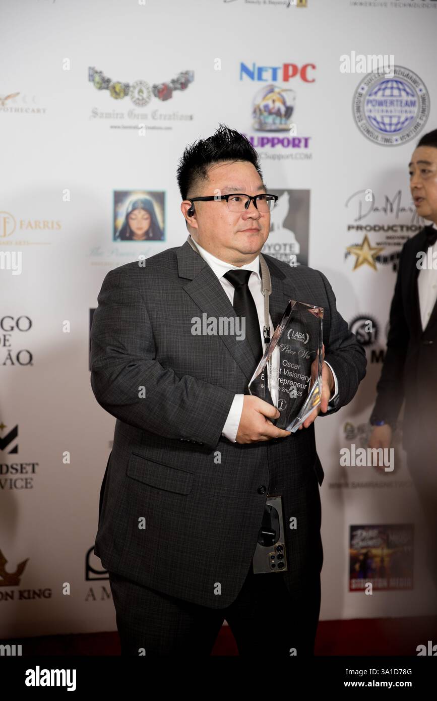 Peter Wu with his award with his award at the Luxury Gala Academy Awards 2025 Viewing Party at ...