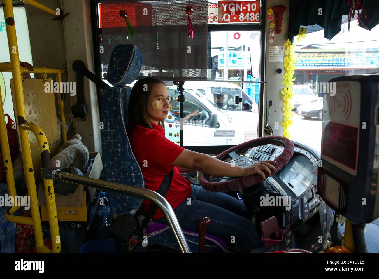Yangon, Myanmar. 8th Mar, 2025. Yin Yin Aye, a Yangon Bus Service (YBS ...