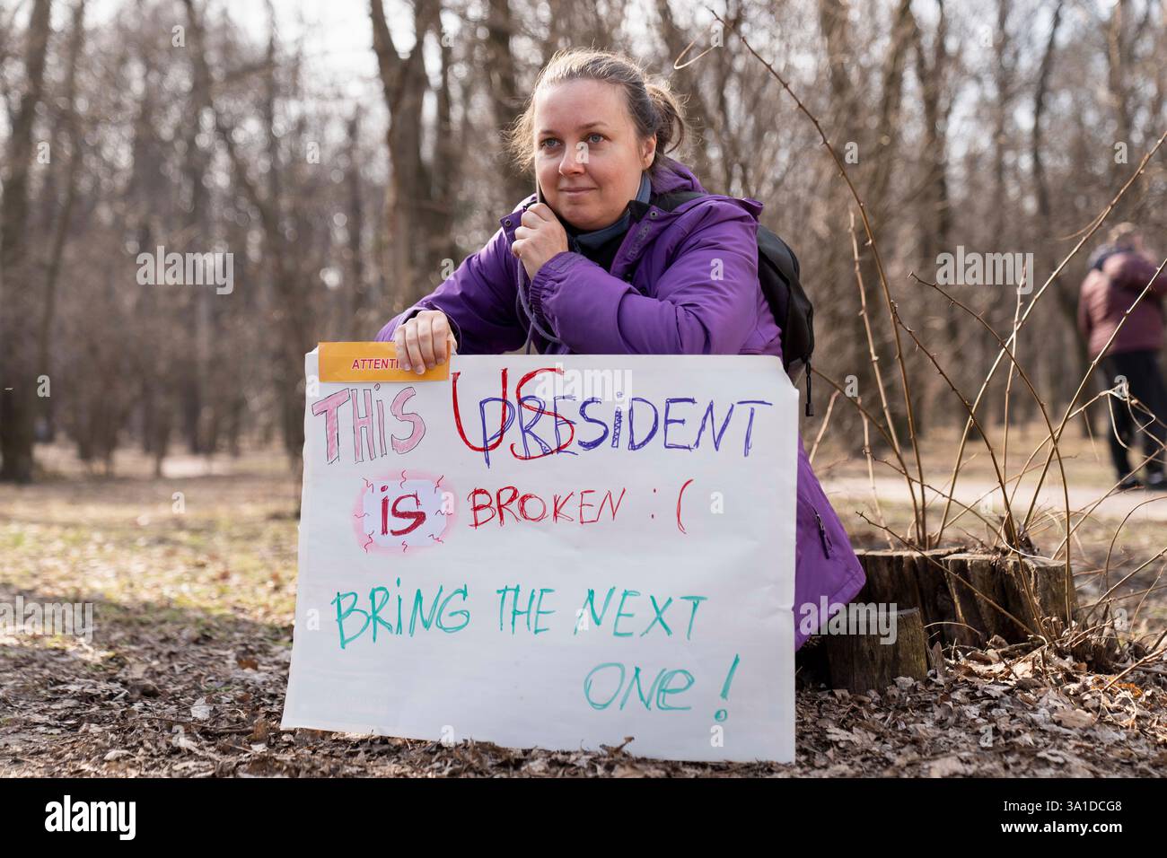 Protesters gather to condemn Trump for stopping military aid to Ukraine ...