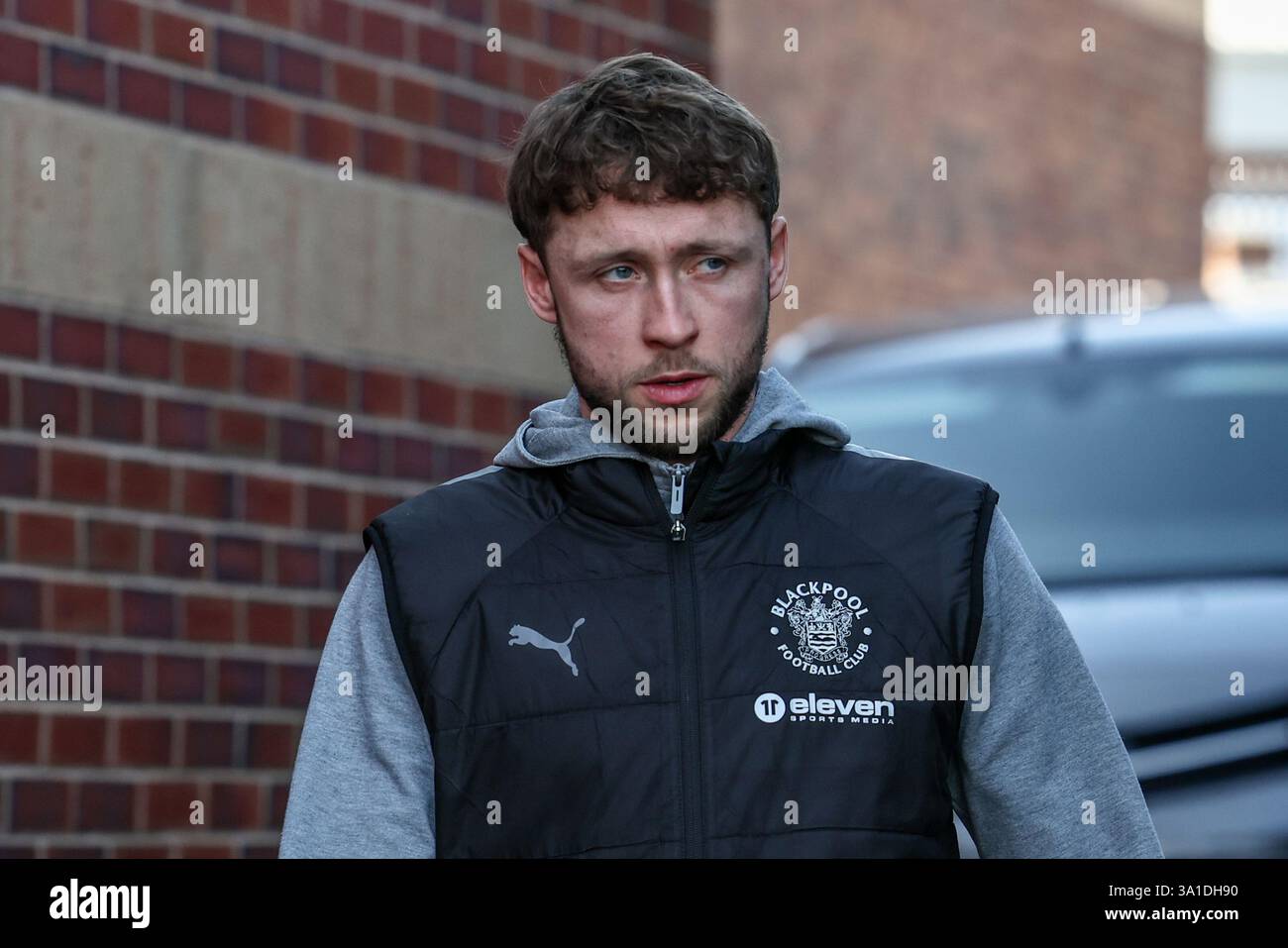 Matthew Pennington of Blackpool arrives during the Sky Bet League 1 ...