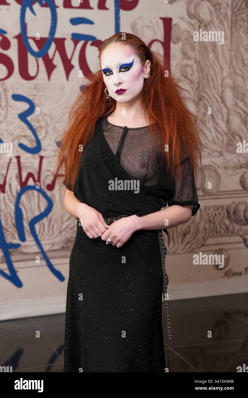 EDS NOTE: NUDITY - Chappell Roan poses for photographers during the ...