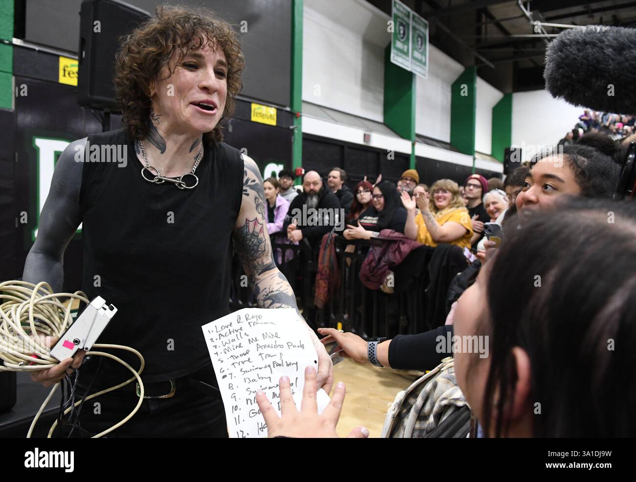 March 7, 2025, Somers, Wisconsin, USA: LAURA JANE GRACE gives a fan her ...