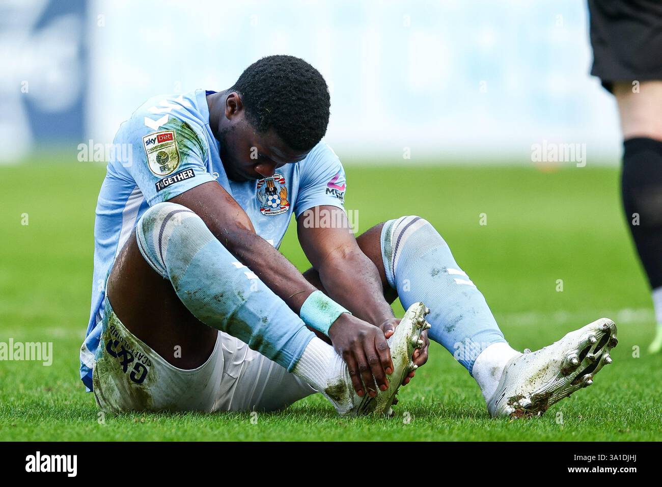 #10, Ephron Mason-Clark of Coventry City adjusts his boot during the ...