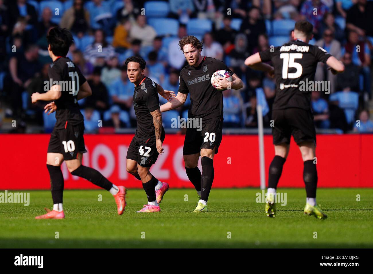 Stoke City's Sam Gallagher (centre right) celebrates with team-mates ...