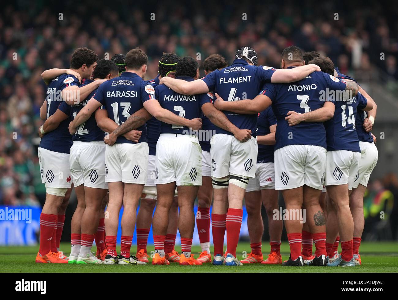 France players huddle ahead of the Guinness Men's Six Nations match the ...