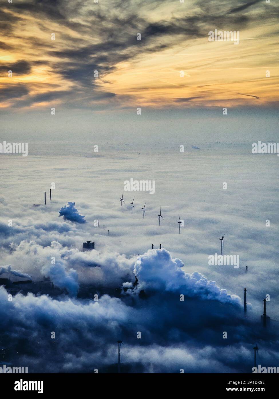 Sunrise view over wind turbines and clouds near Amsterdam highlighting ...