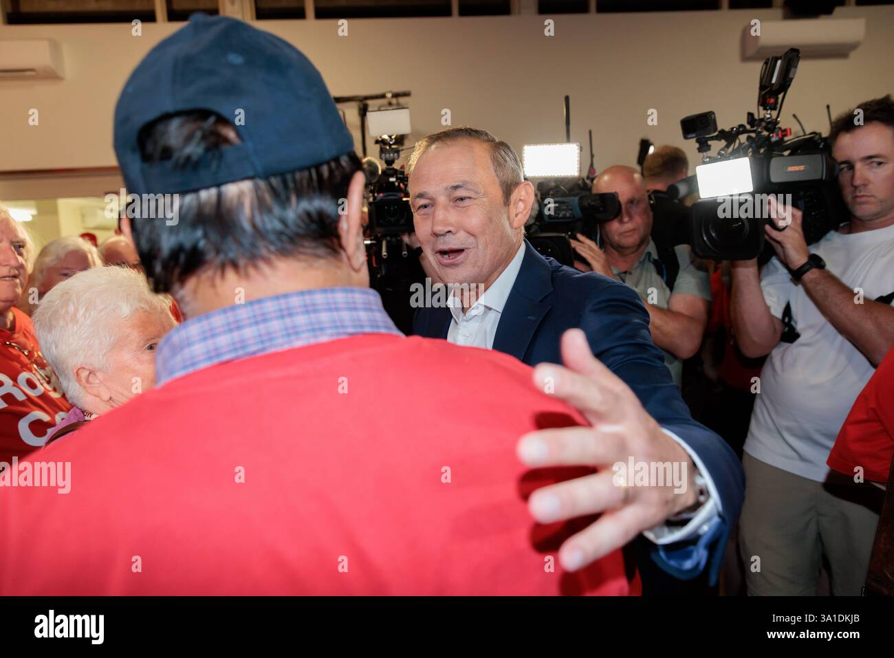 Western Australia Premier, Roger Cook is congratulated by supporters at ...