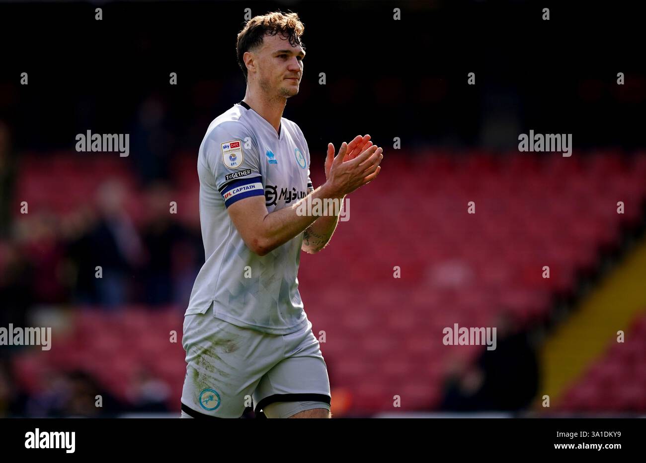 Millwall's Jake Cooper celebrates after the Sky Bet Championship match ...