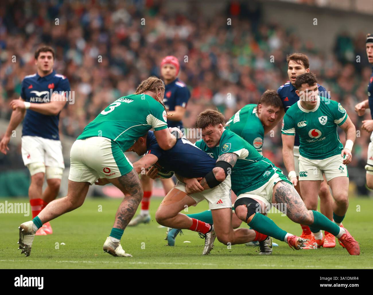 France's Pierre Louis Barassi tackled by Ireland's Andrew Porter (left ...